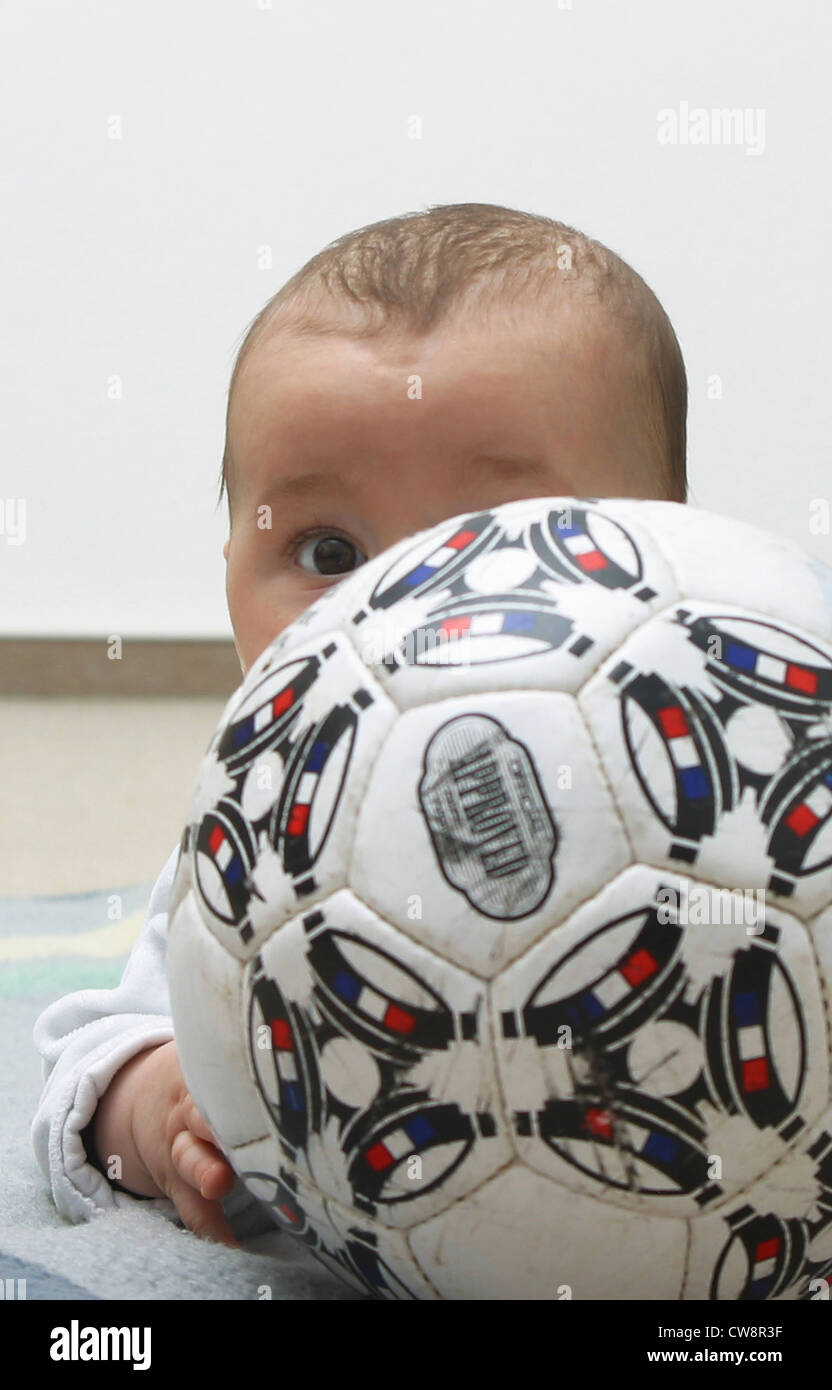 Baby with Soccer Stock Photo - Alamy