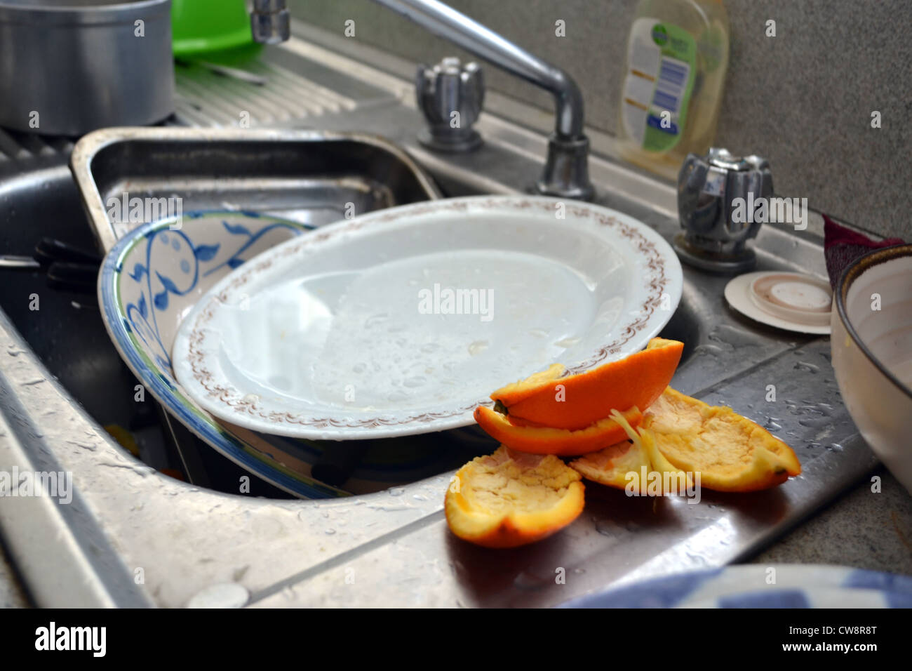 Sink Full Of Dirty Dishes High Resolution Stock Photography and Images ...