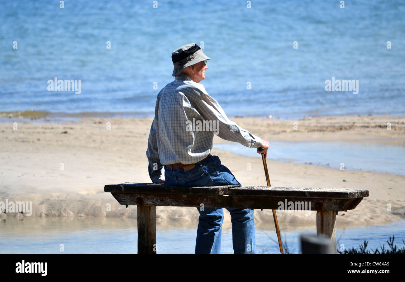 Bench looking sea ocean sitting stick hi-res stock photography and ...