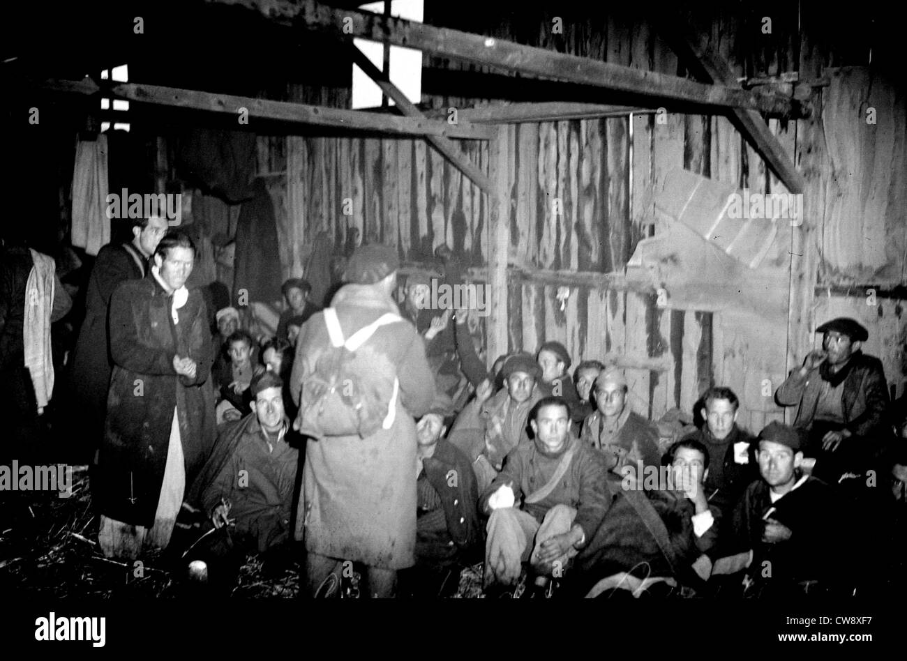 Spanish refugees - Militiamen at camp Le Boulou Stock Photo - Alamy