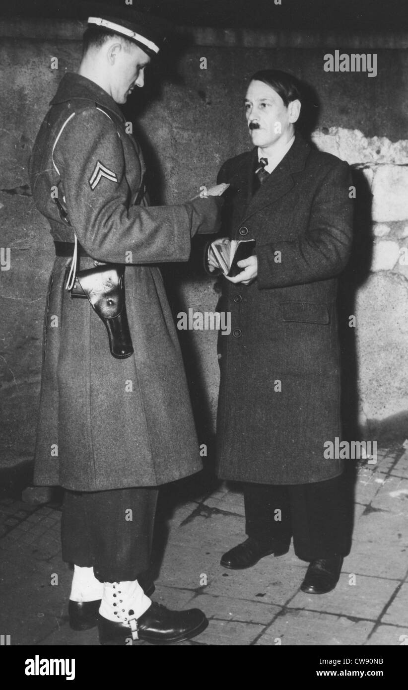 Hitler's double arrested by a US policeman (1950 Stock Photo - Alamy