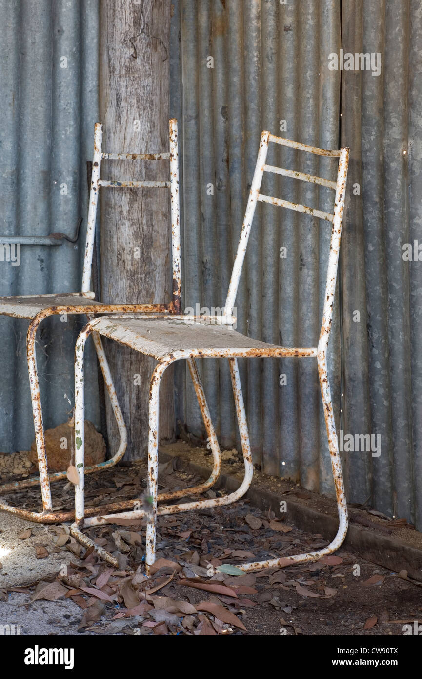 Rusty old chairs in an abandoned shack Stock Photo - Alamy