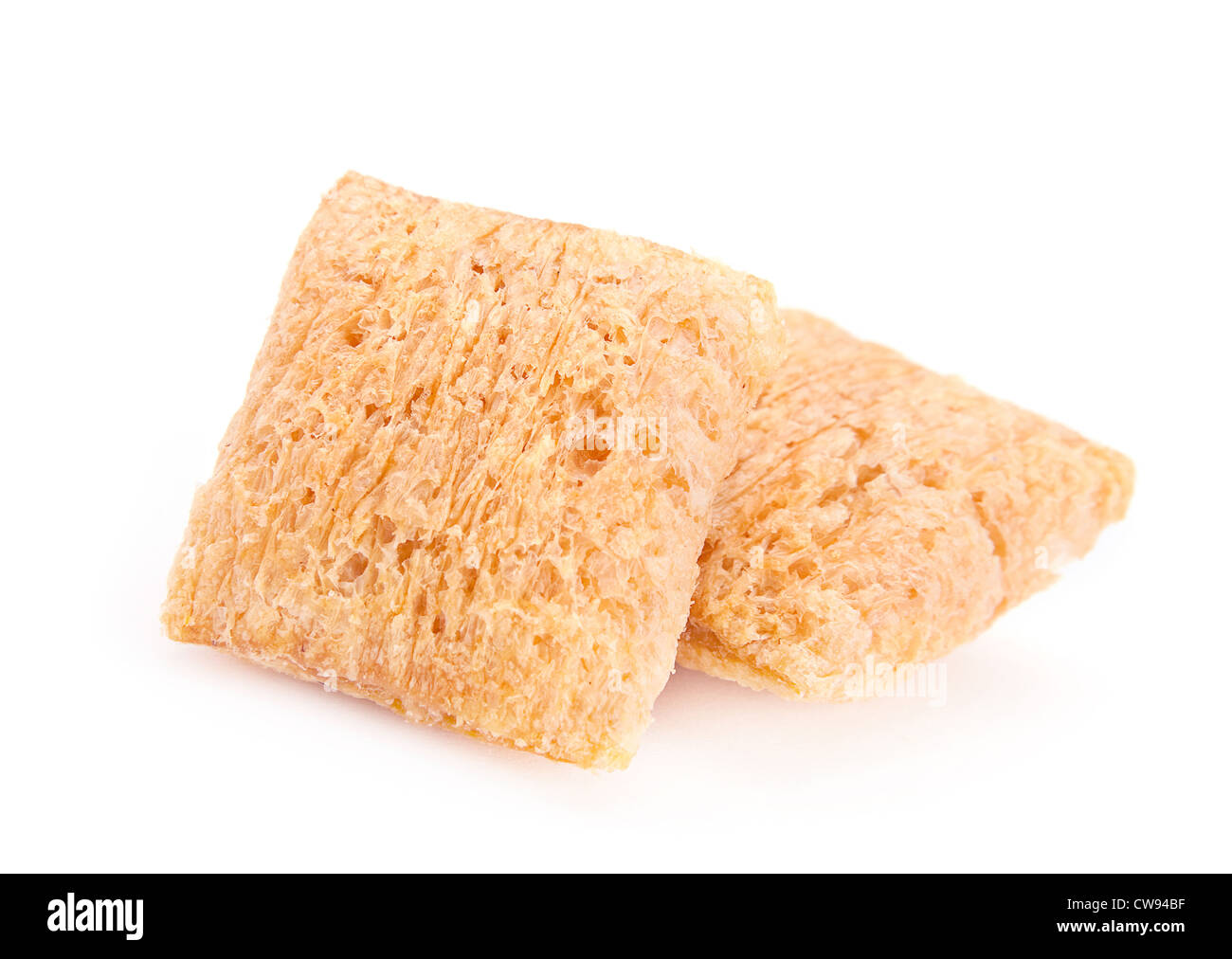 Cornflakes cube snack isolated on white Stock Photo - Alamy
