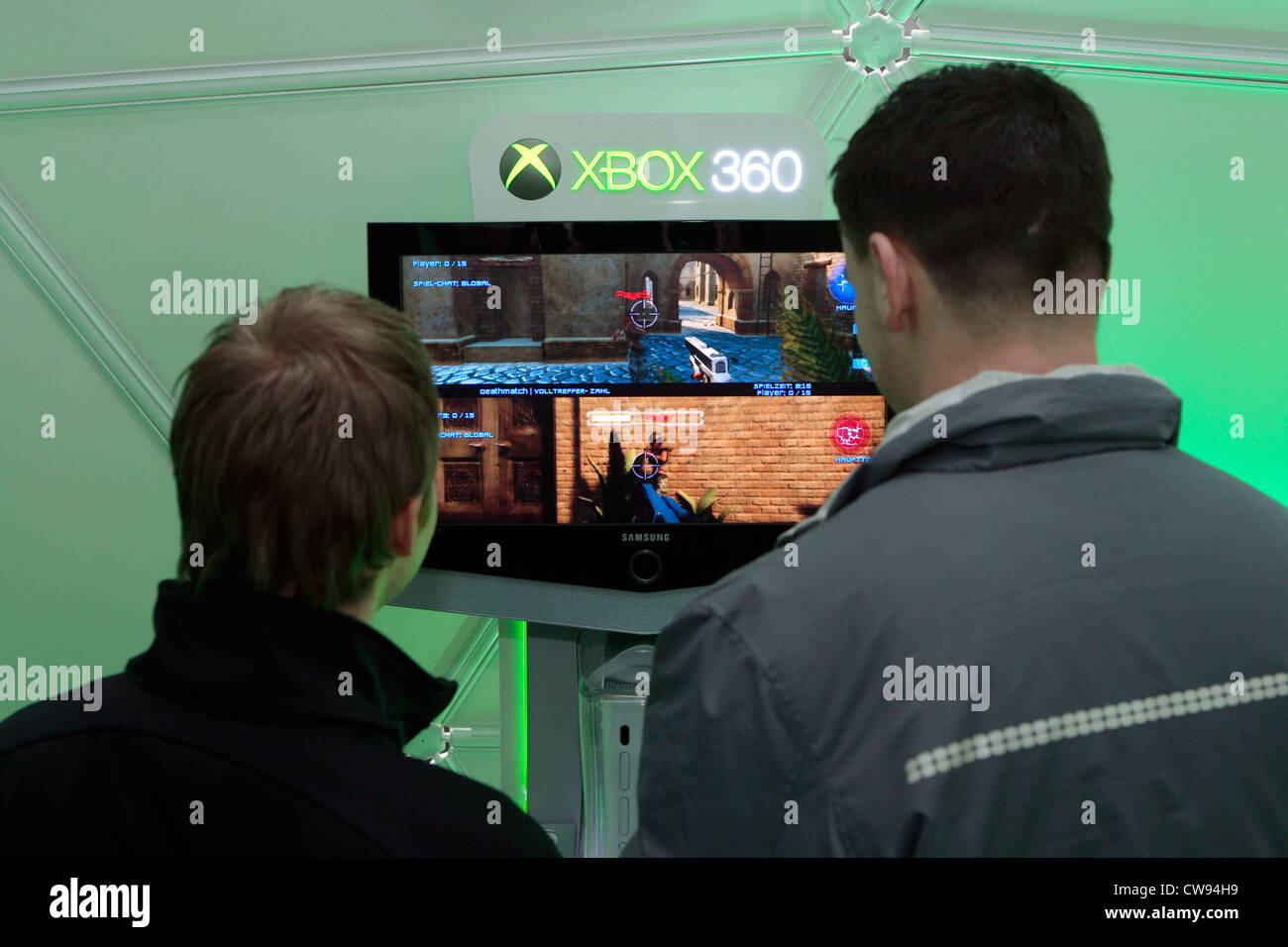 Teenagers playing with the XBOX 360 Stock Photo - Alamy