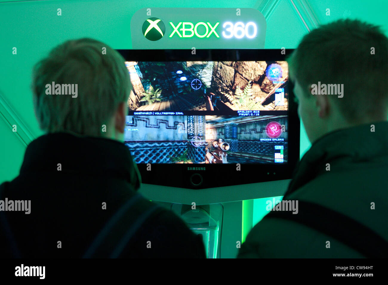 Teenagers playing with the XBOX 360 Stock Photo - Alamy