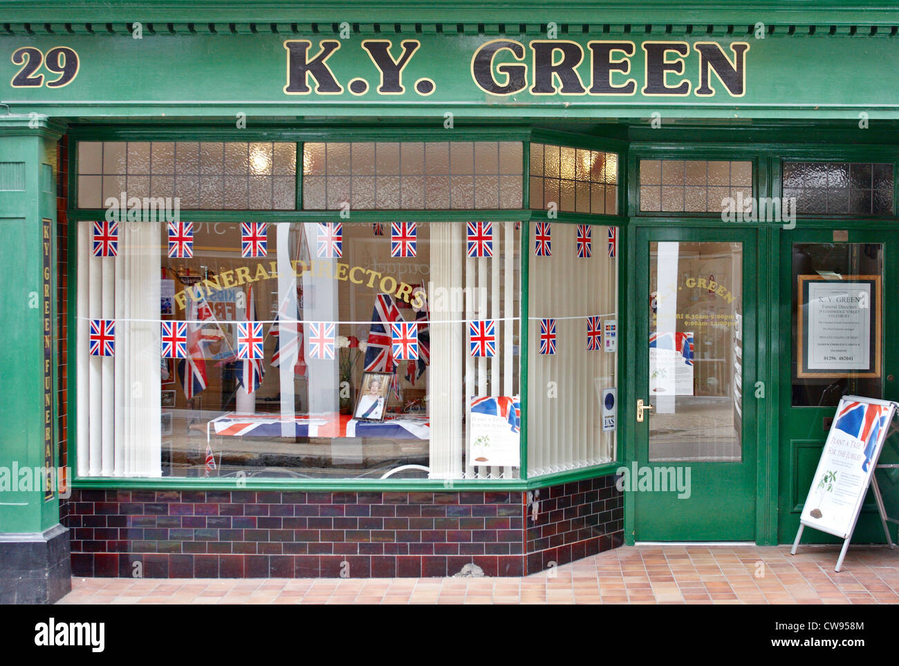 A funeral directors shop window in Aylesbury displays bunting and a ...