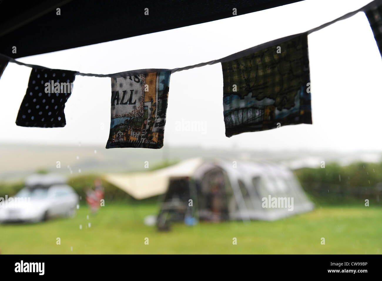 Handmade Cornish Bunting hanging from a tent at Treveague campsite near ...