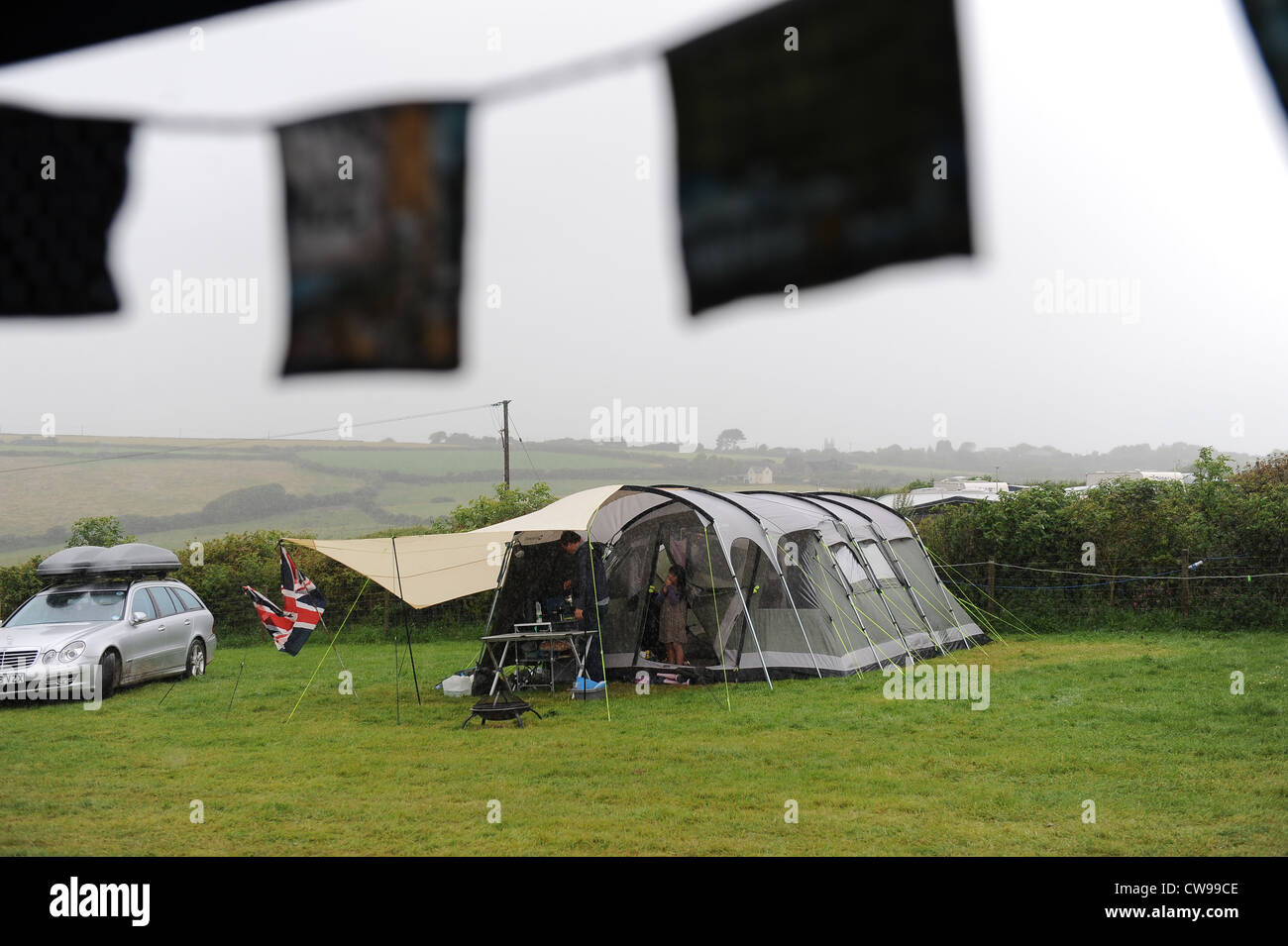 Handmade Cornish Bunting hanging from a tent at Treveague campsite near ...