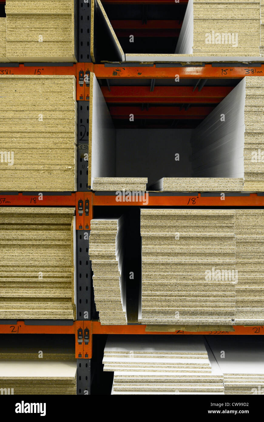 Stacked wood in timber merchant warehouse Stock Photo - Alamy