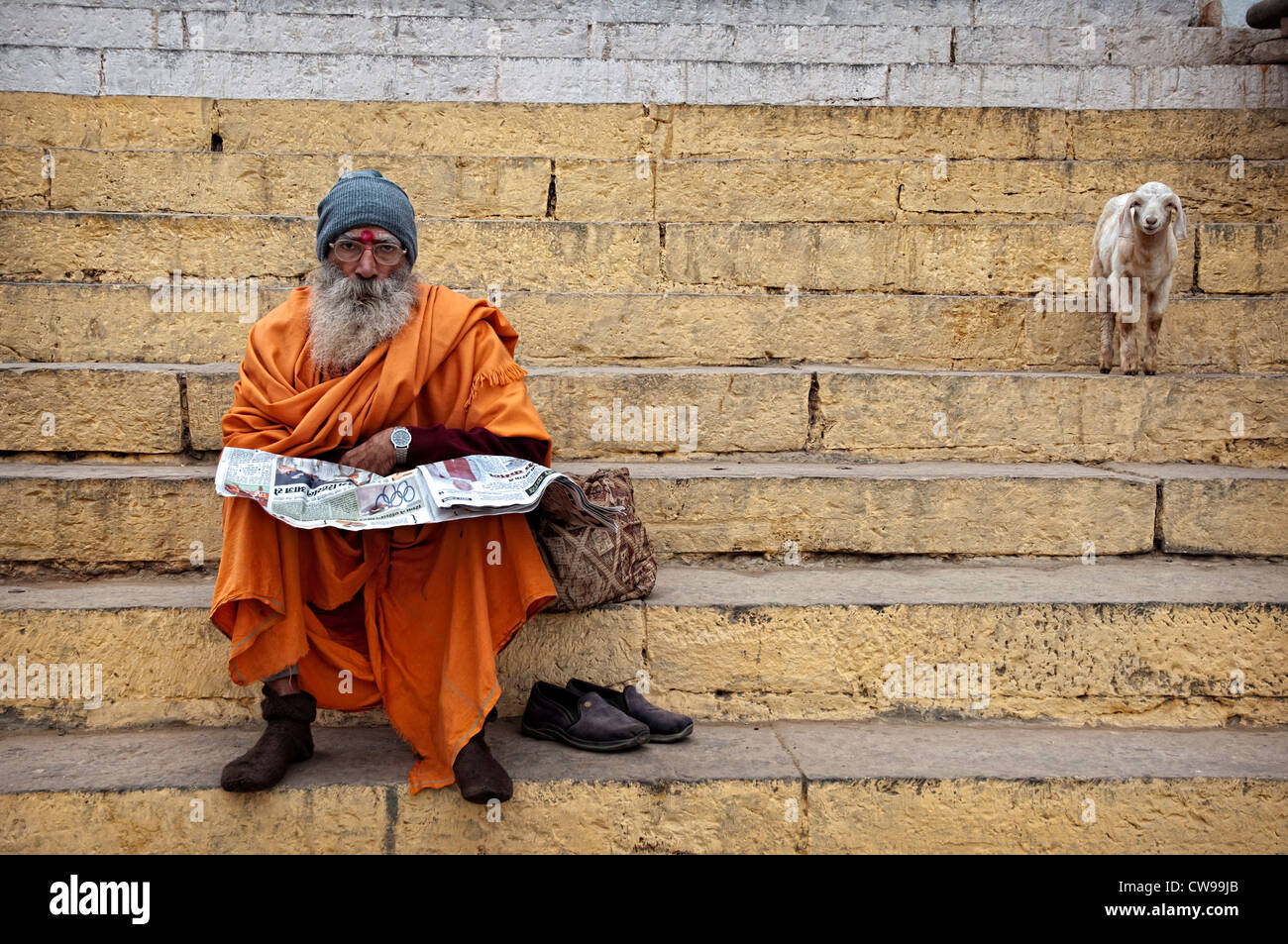 Sadhu sitting on stairs hi-res stock photography and images - Alamy