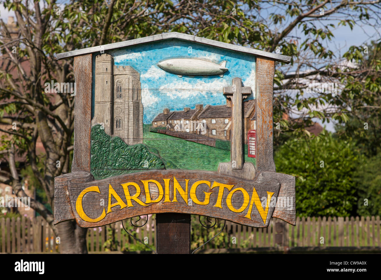 Sign for the village of Cardington, showing the R101 airship which was ...