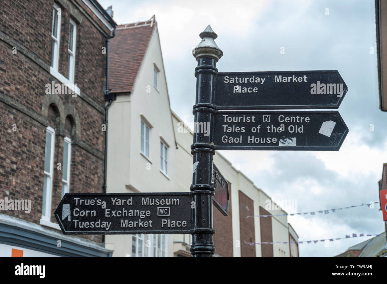 Signpost in the centre of King's Lynn Norfolk UK pointing the way to ...
