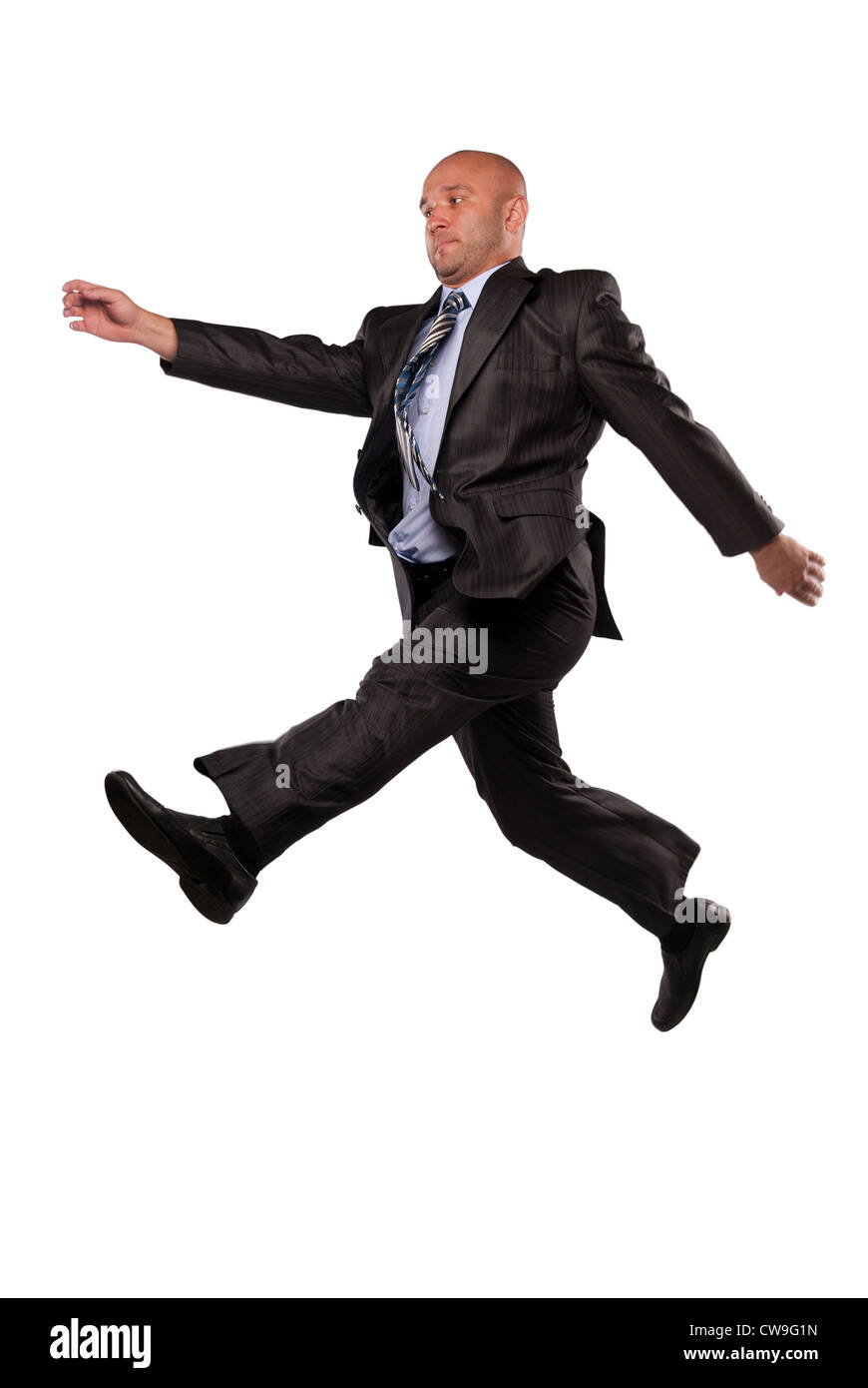man in business suit flies. Isolated background Stock Photo - Alamy