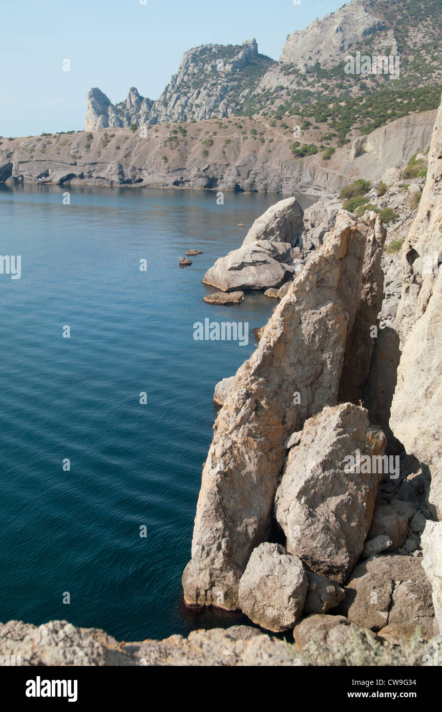 Marine landscape with views of sea and rocks on the shore Stock Photo ...