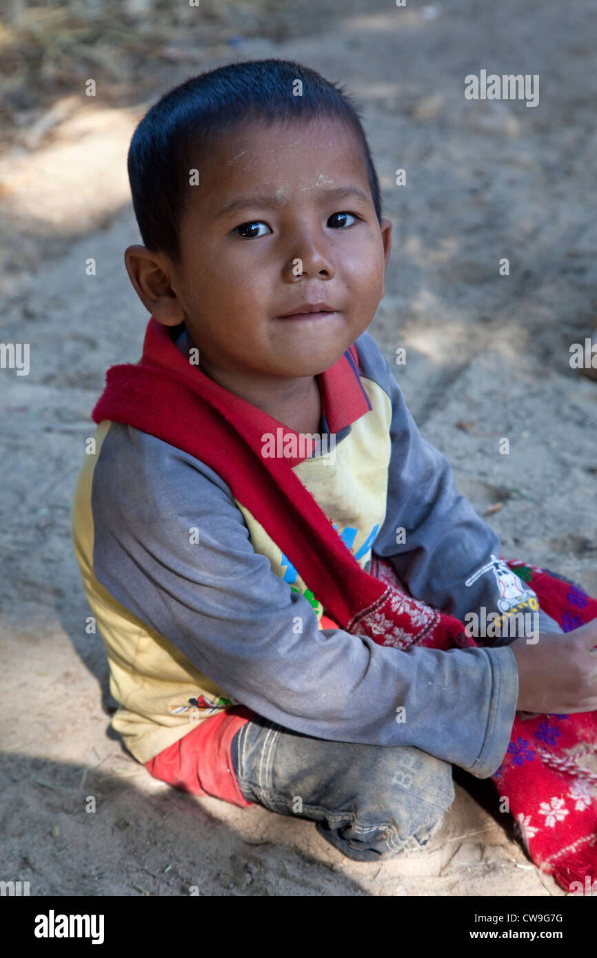 Myanmar, Burma, near Bagan. Little Burmese Boy in Village Stock Photo ...
