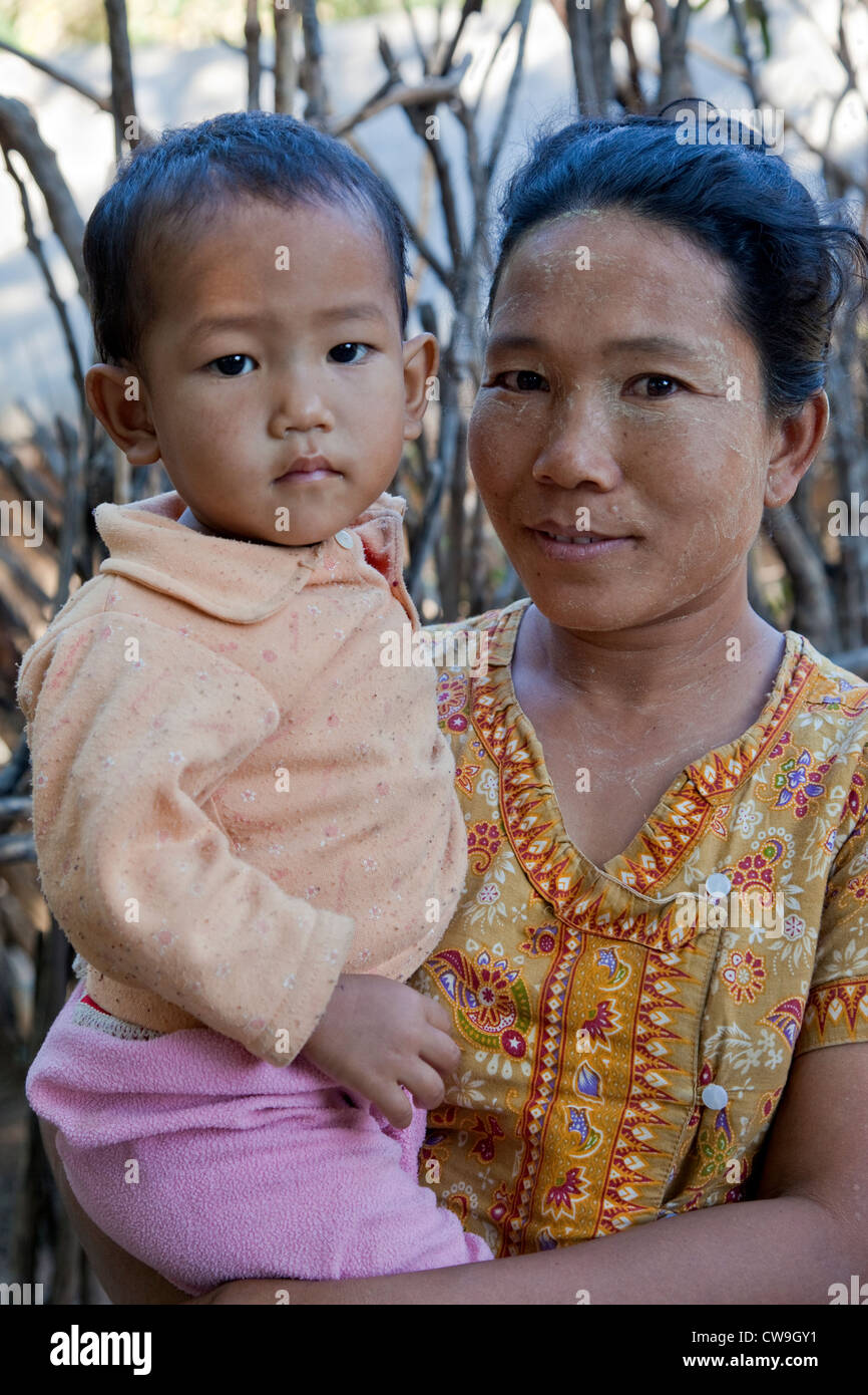 Myanmar, Burma. Burmese Mother Holding Little Boy in a Village near ...