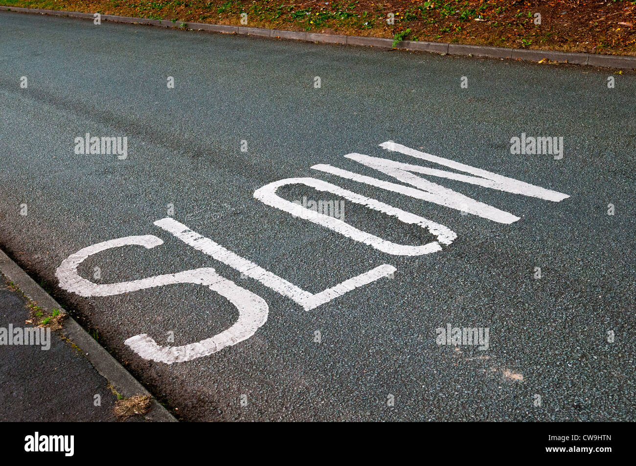 Slow road sign uk hi-res stock photography and images - Alamy