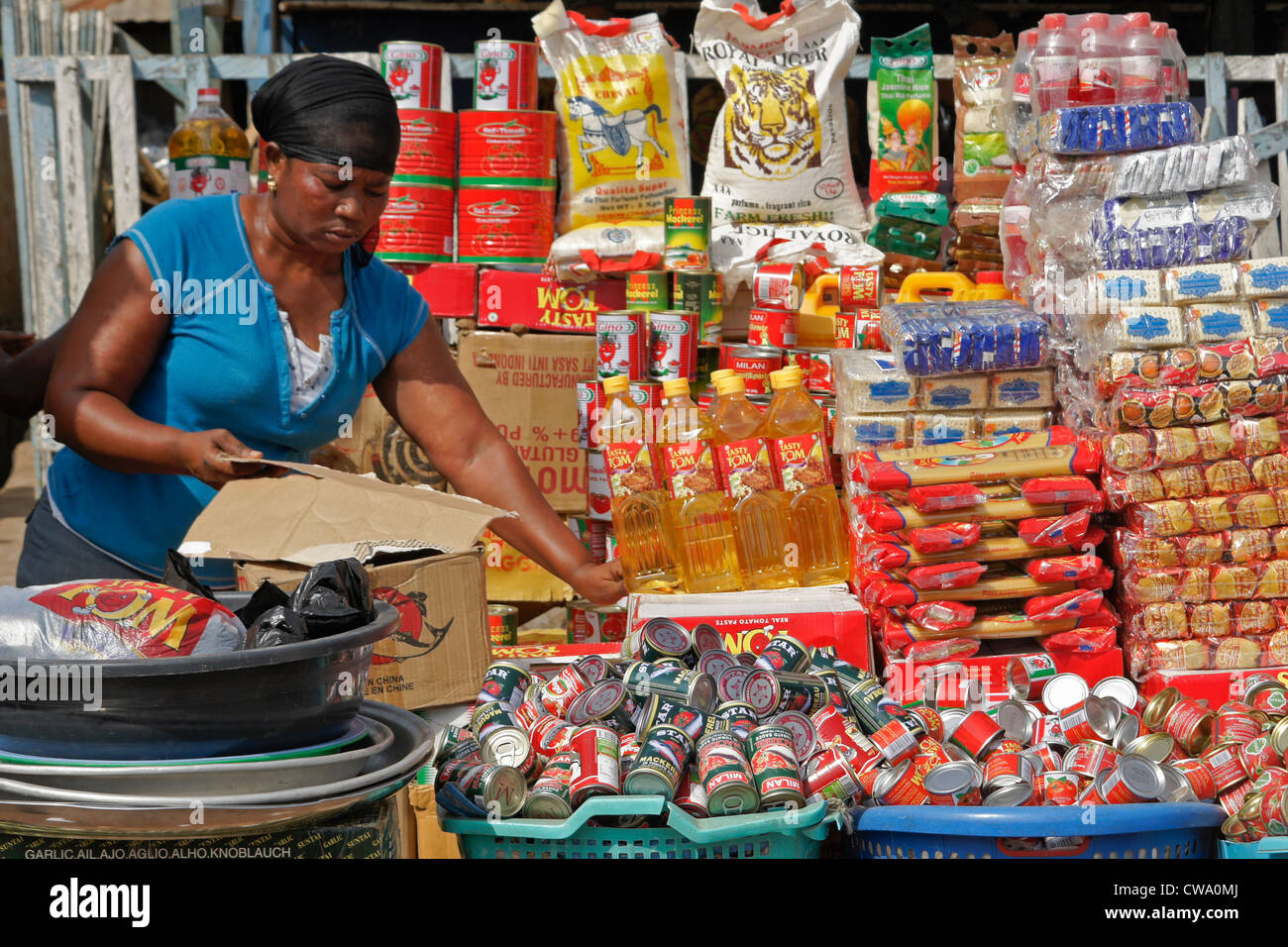 Woman selling sundries in open-air market, Agomanya, Ghana Stock Photo ...