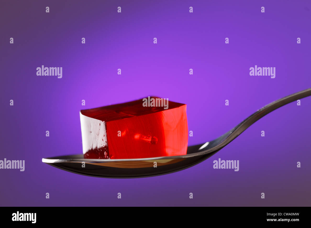 Red Jelly on the spoon Stock Photo - Alamy