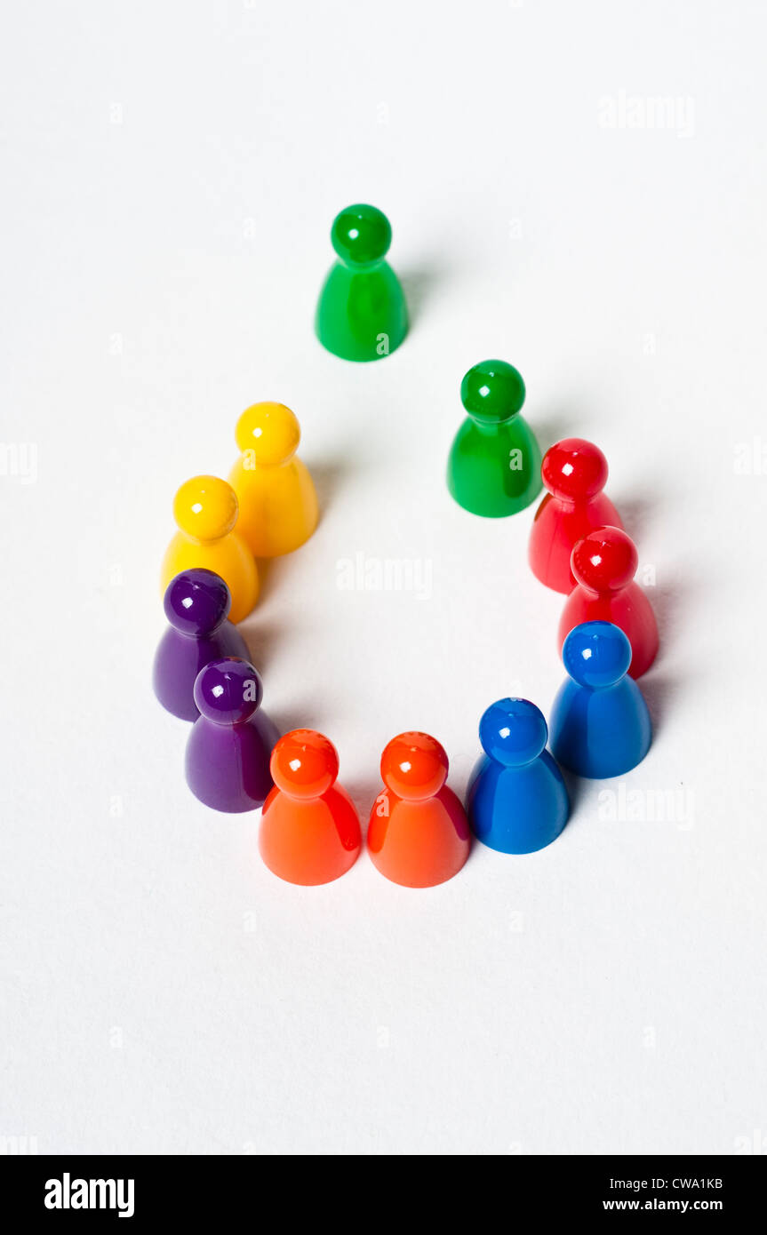 Colourful pawns making a circle Stock Photo - Alamy