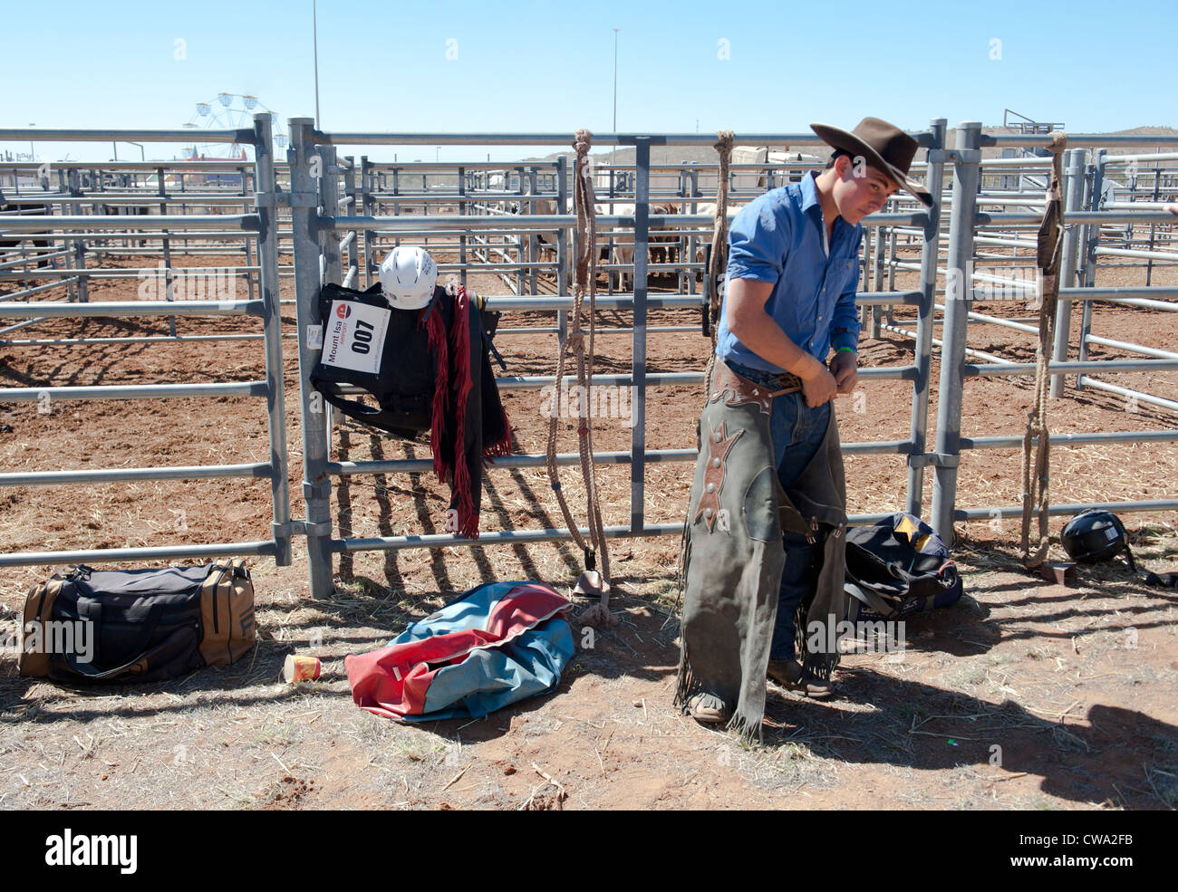Young cowboy preparing himself for the bull riding contest of the Mount ...