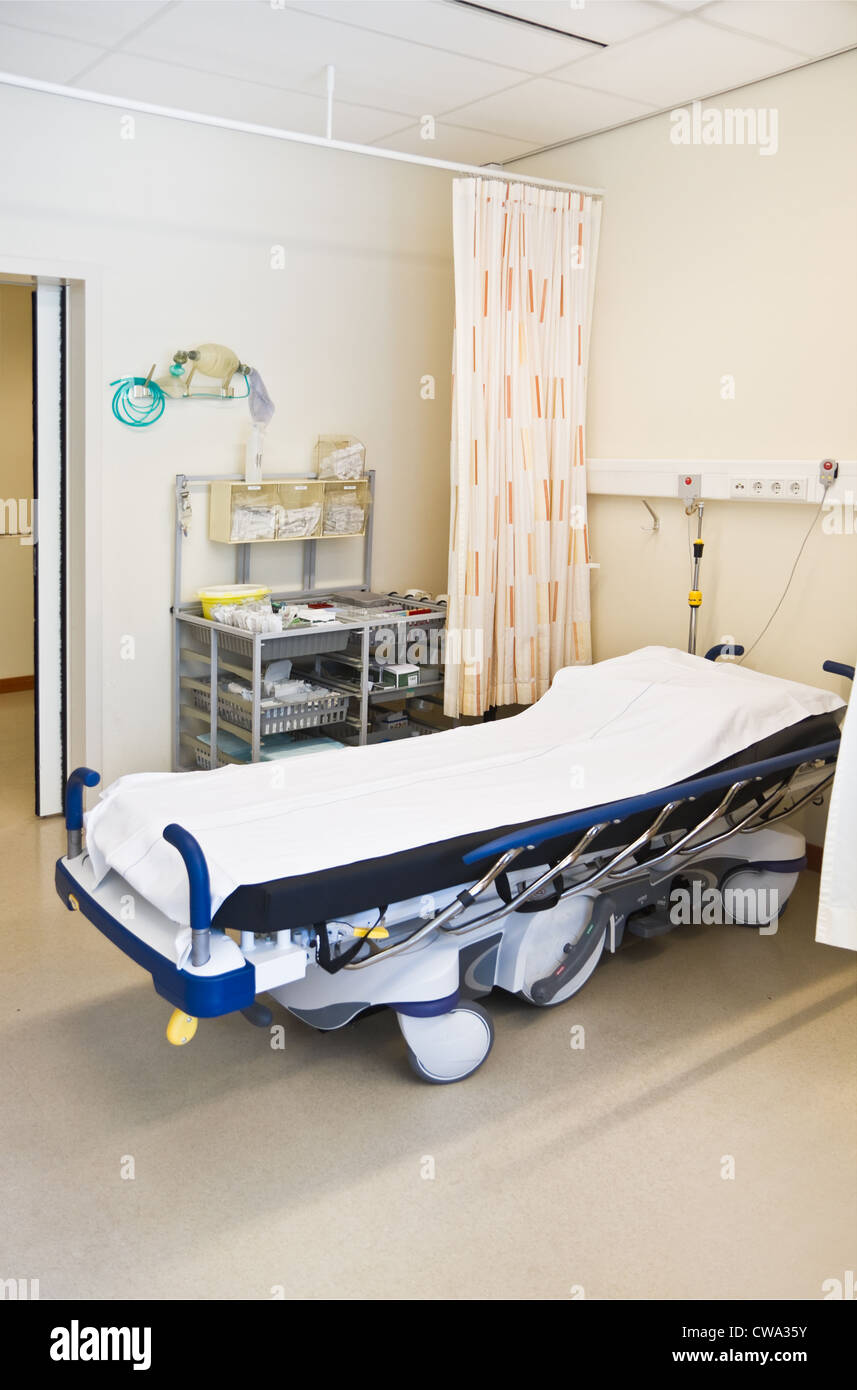 First aid in hospital with bed, monitor and medical equipment Stock ...