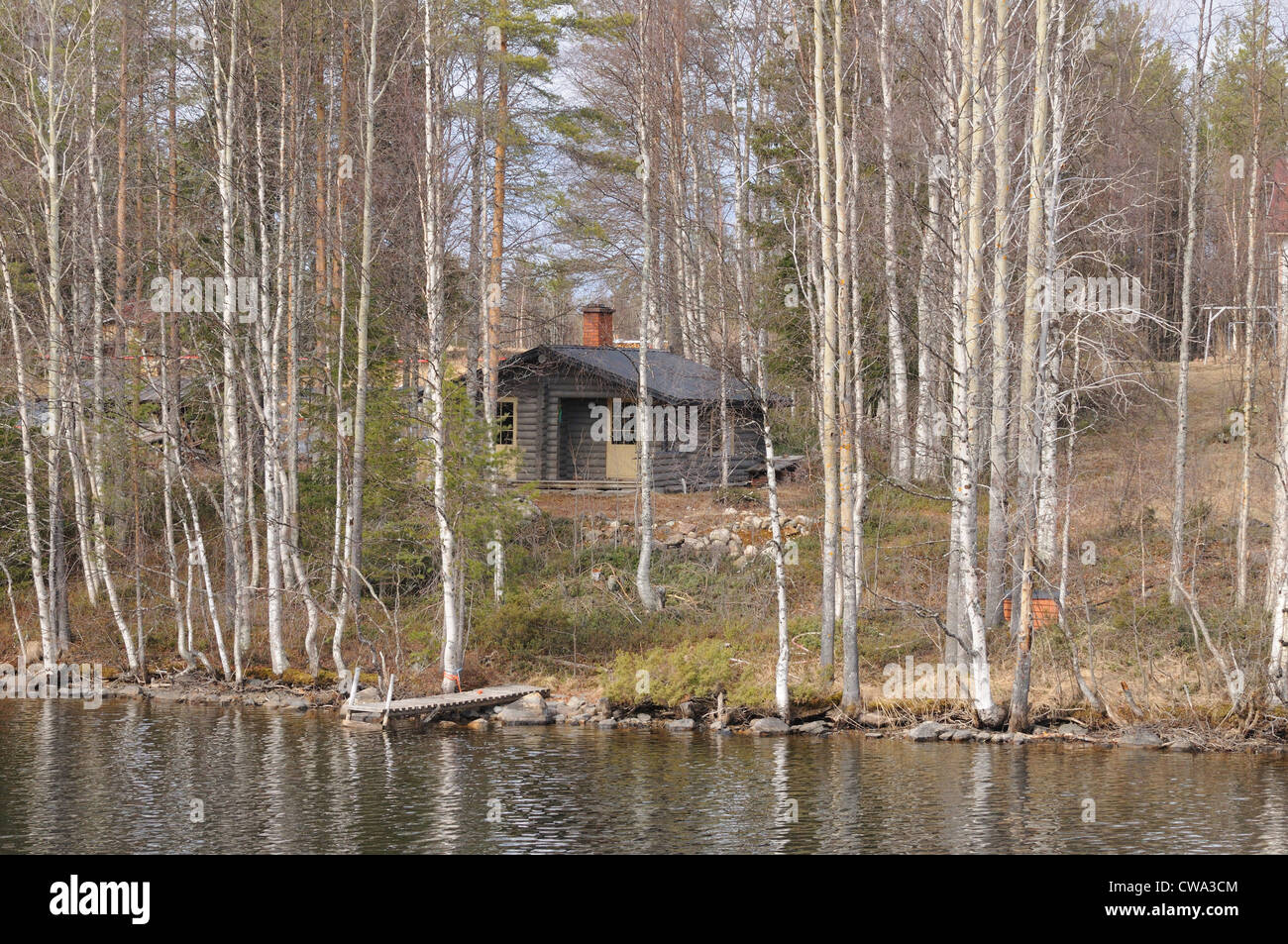 typical Finnish home in the forest near the river, Kuusamo, Finland ...