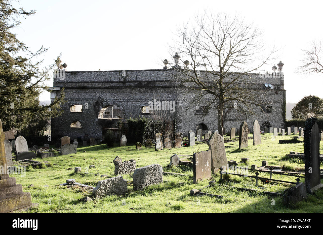 It's a photo of a cemetery in England. We can see tombstones in the ...