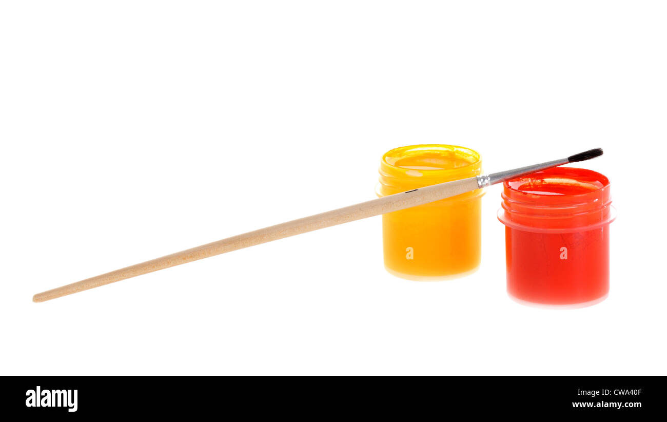 Two paints and brush isolated on white background Stock Photo - Alamy