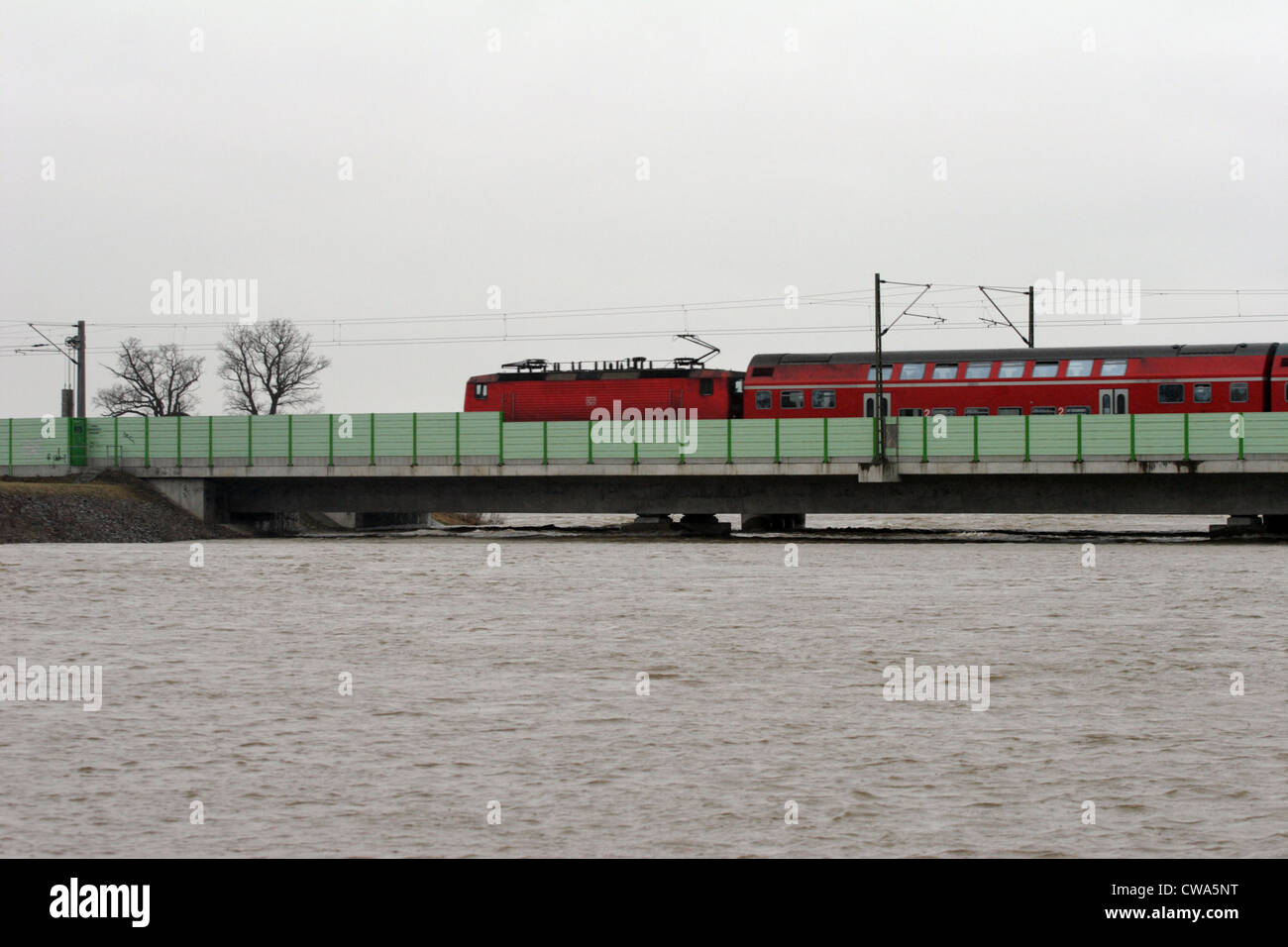 Floods on the Elbe: train leaves over a bridge Stock Photo - Alamy