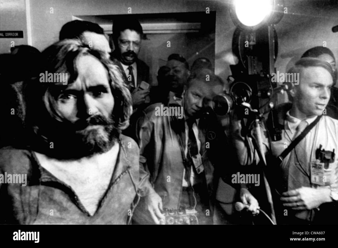 Charles Manson, the 35-year-old cult leader, is escorted through a ...