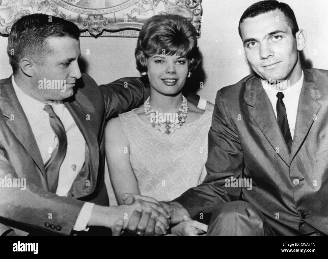 George Steinbrenner (left), shakes hands with Jerry Lucas (right), All ...