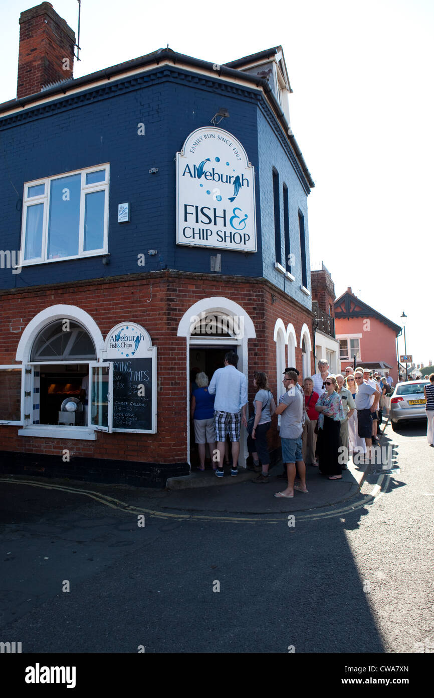 A long queue outside Aldeburgh fish and chip shop Stock Photo - Alamy