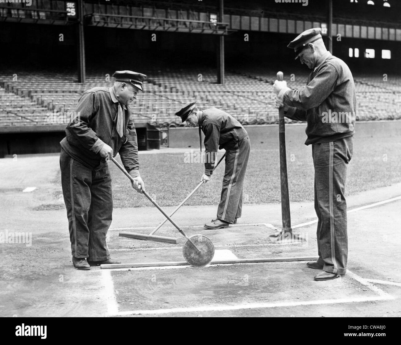 Groundskeepers preparing home plate for the World Series, Yankee ...
