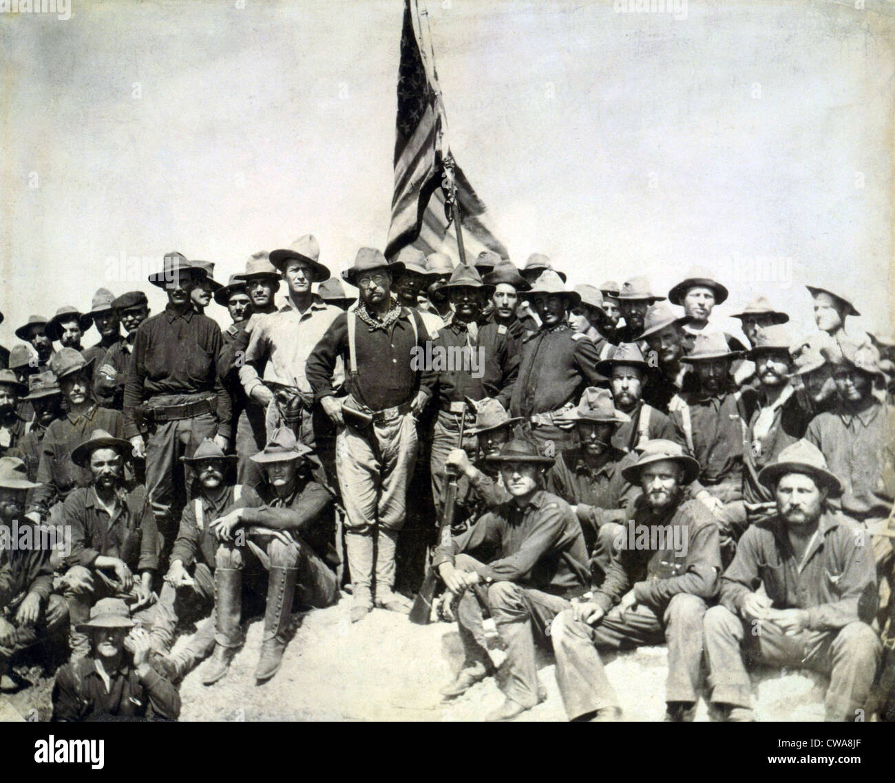 Colonel Roosevelt and his Rough Riders at the top of the hill which ...