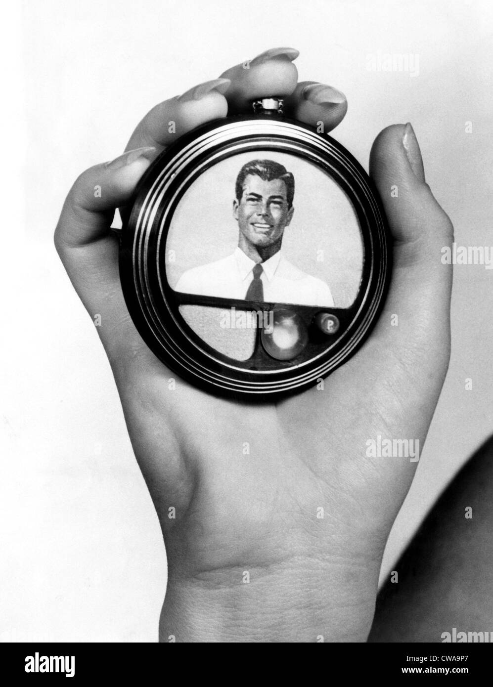Model holding phone Black and White Stock Photos & Images - Alamy