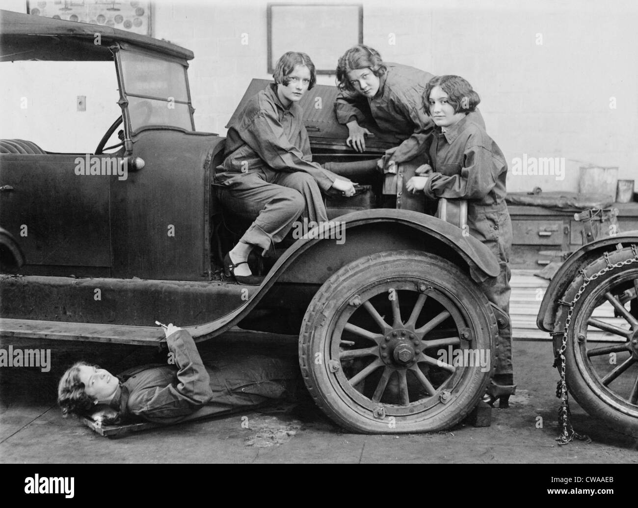 Overall clad high school girls learn automobile mechanics in Washington ...
