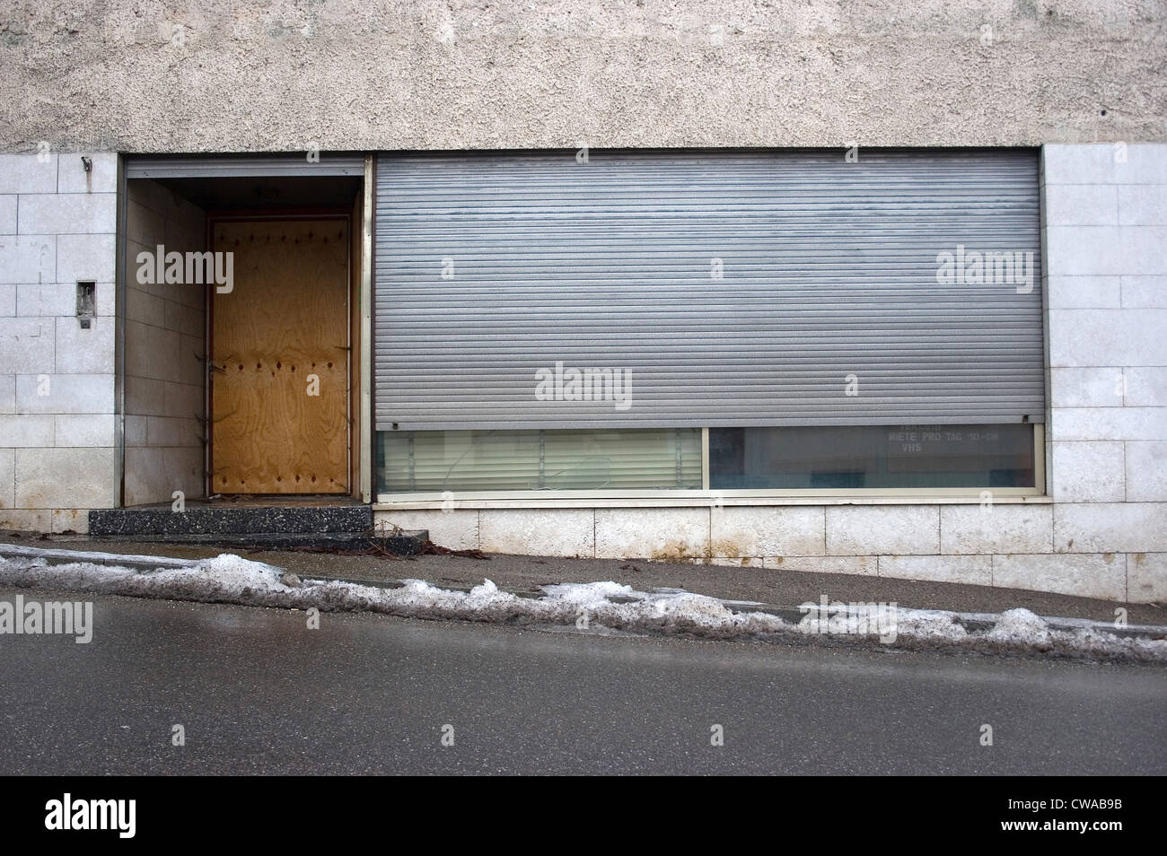 Riedlingen, closed business with lowered shutter Stock Photo - Alamy