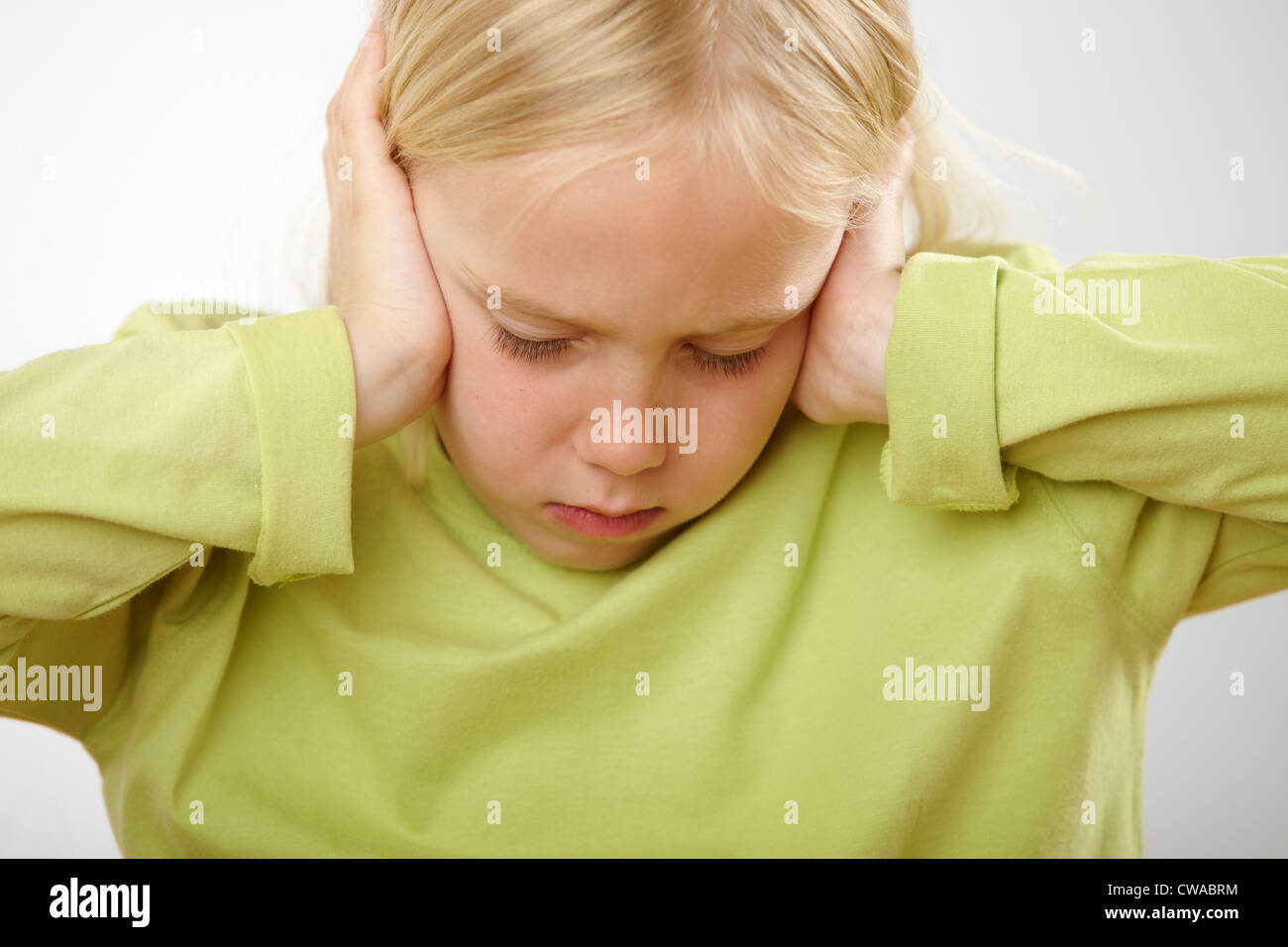 Covering The Ears 5 High Resolution Stock Photography and Images - Alamy