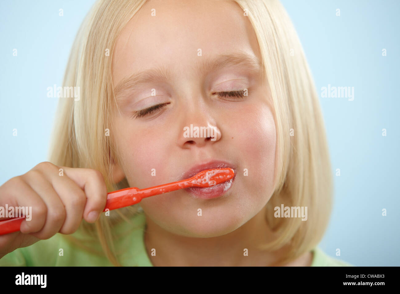 Girl brushing teeth Stock Photo - Alamy
