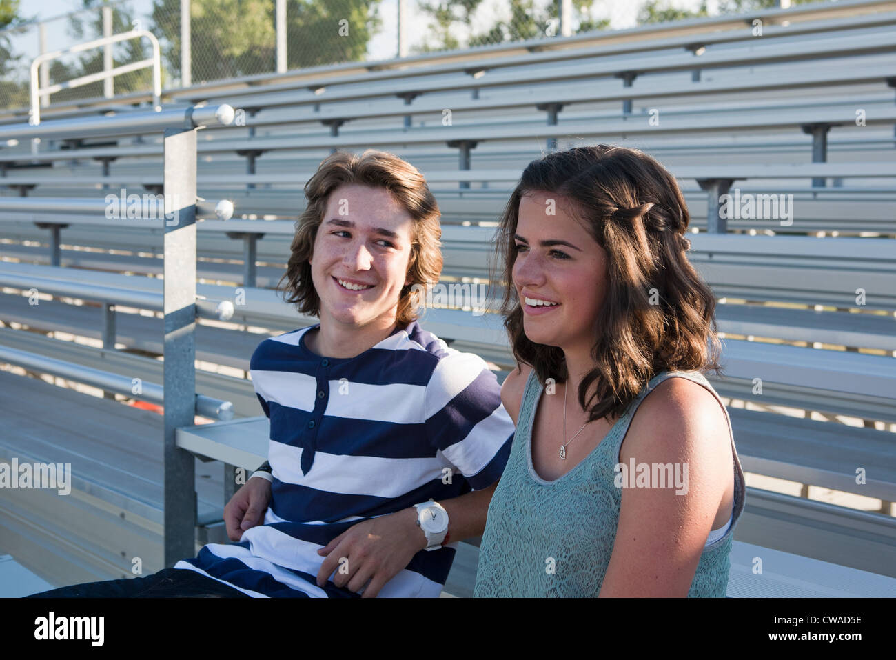 Couple on bleachers hi-res stock photography and images - Alamy