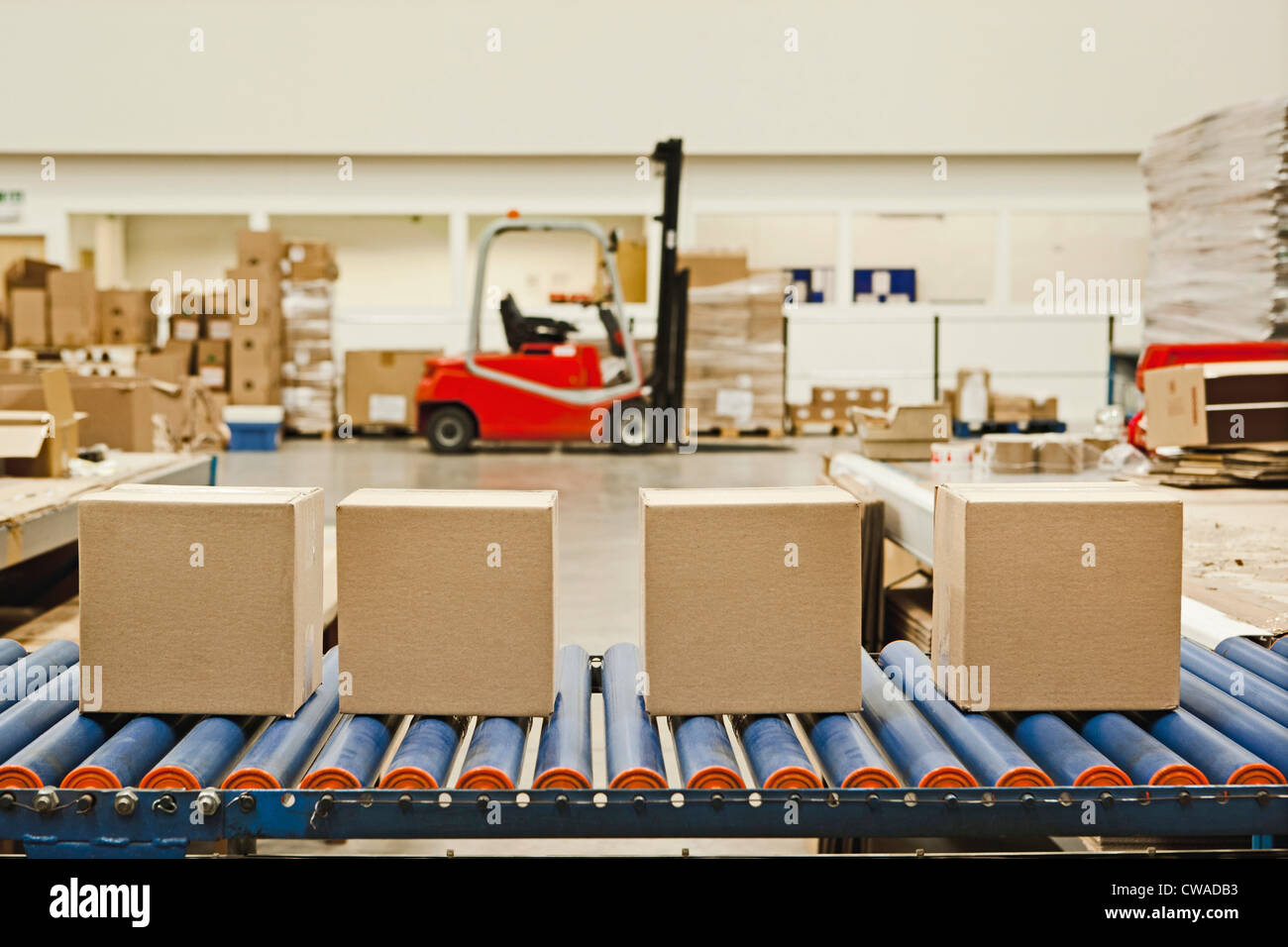 Cardboard boxes forklift in hi-res stock photography and images - Alamy