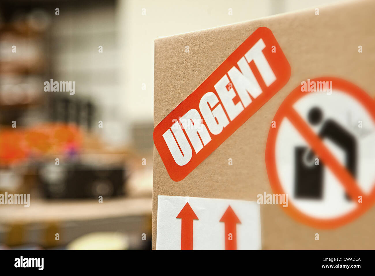 Cardboard box with warning stickers, close up Stock Photo - Alamy
