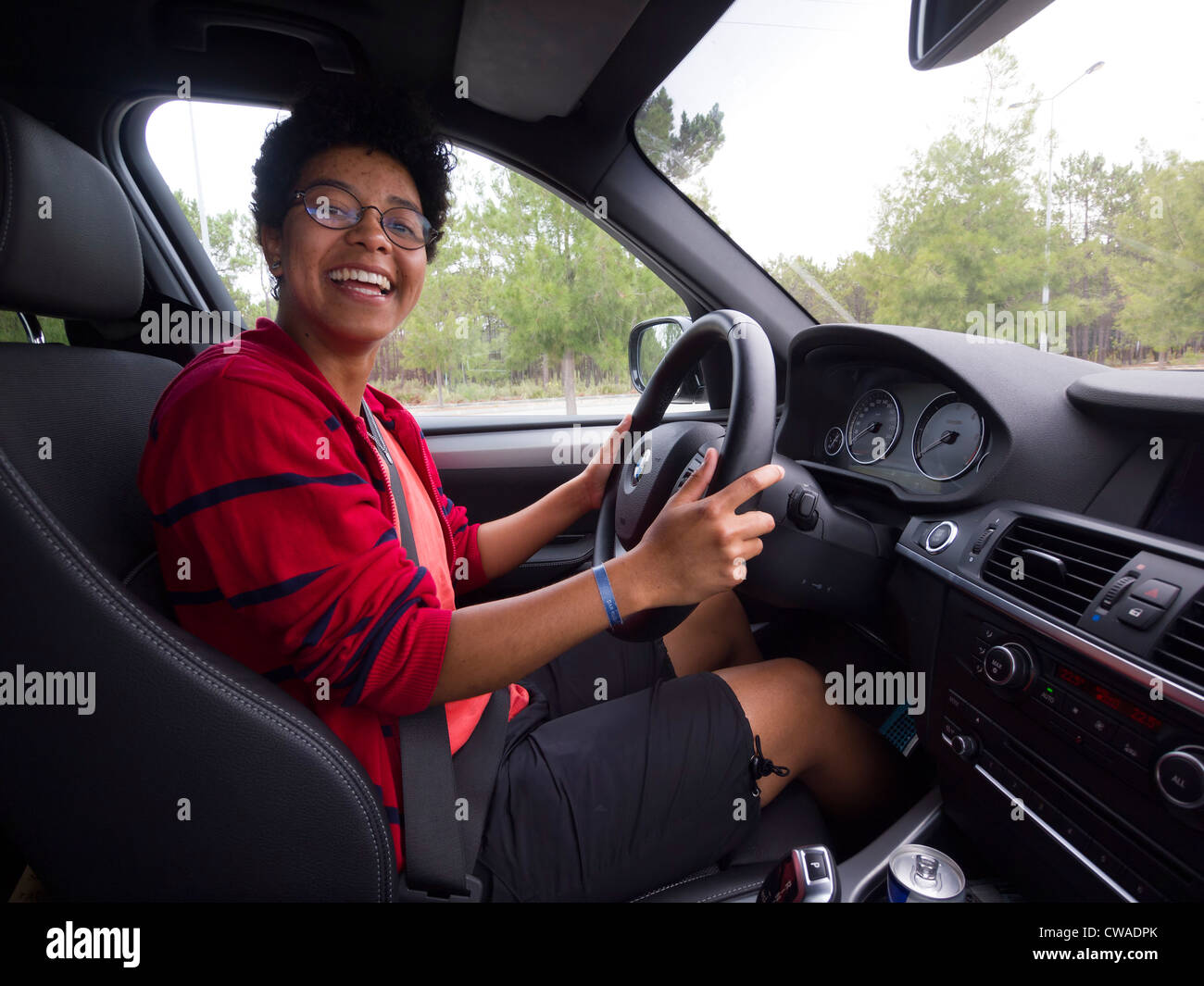 Happy person driving car Stock Photo - Alamy