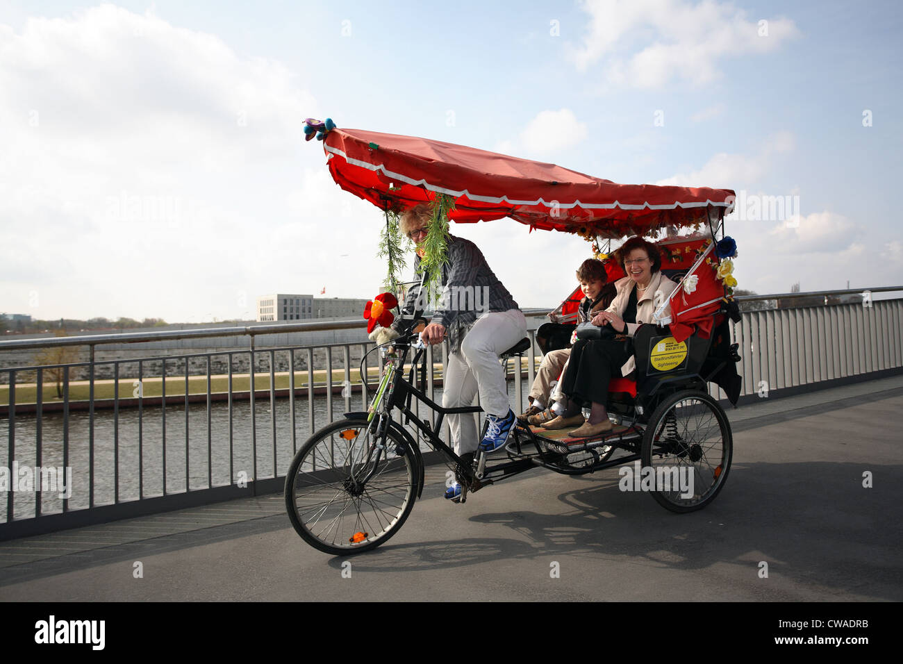 City tour rickshaw berlin hi-res stock photography and images - Alamy