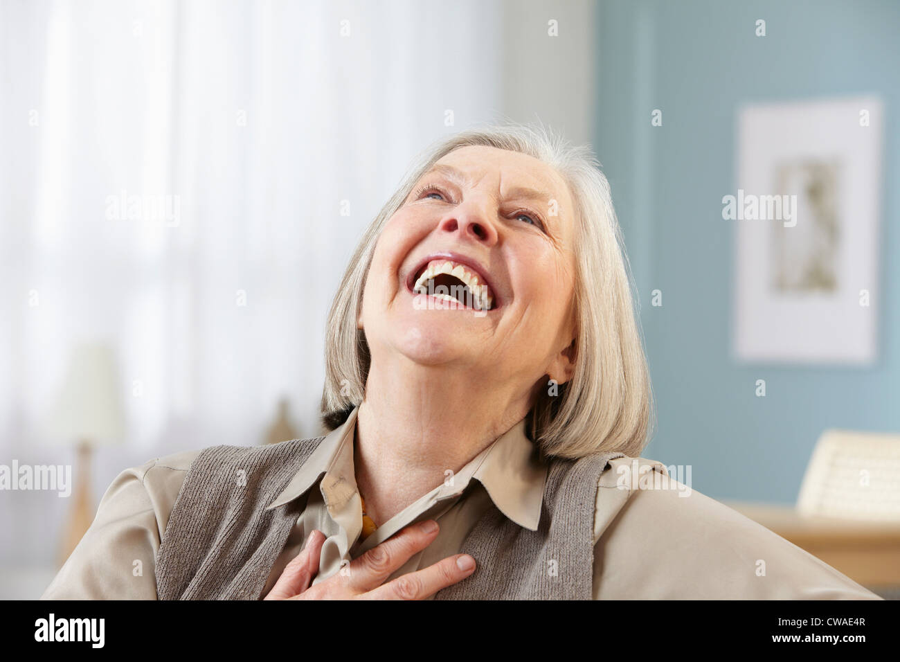 Senior woman laughing, portrait Stock Photo - Alamy