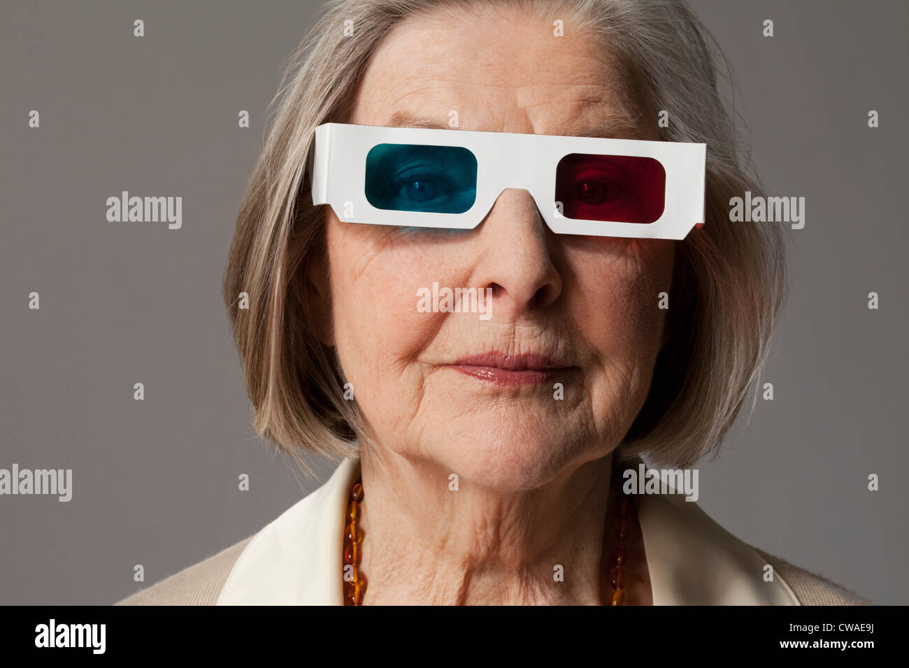 Old woman wearing glasses hi-res stock photography and images - Alamy