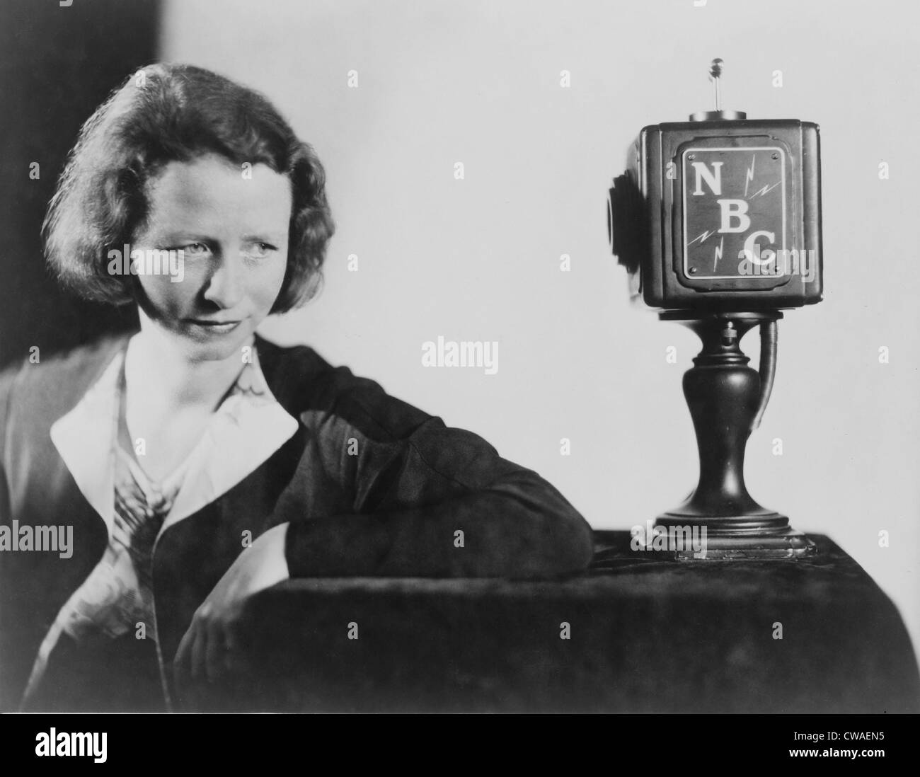 Edna St. Vincent Millay (1892-1950) American poet, seated behind NBC ...