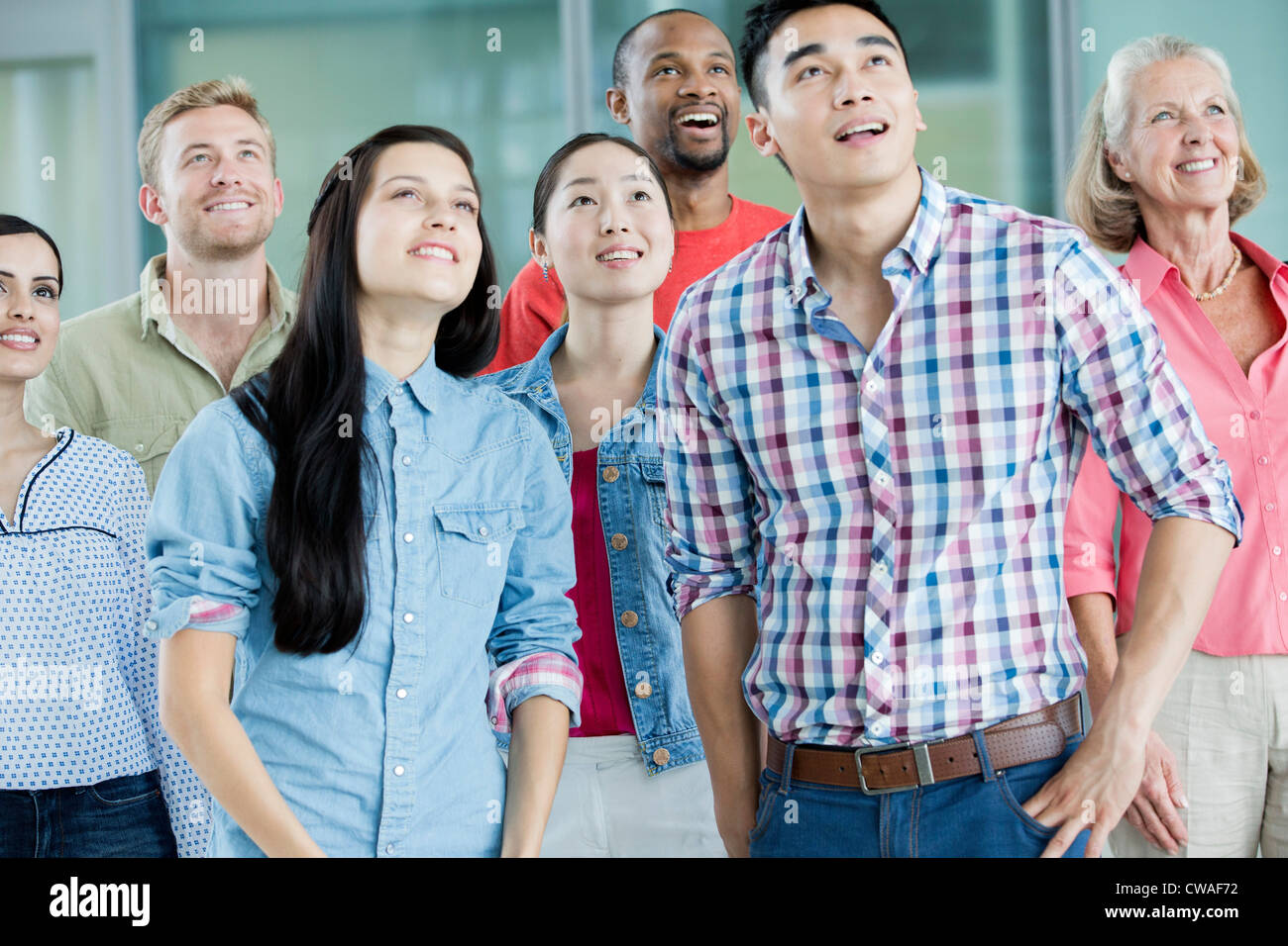 Group of people looking up Stock Photo - Alamy