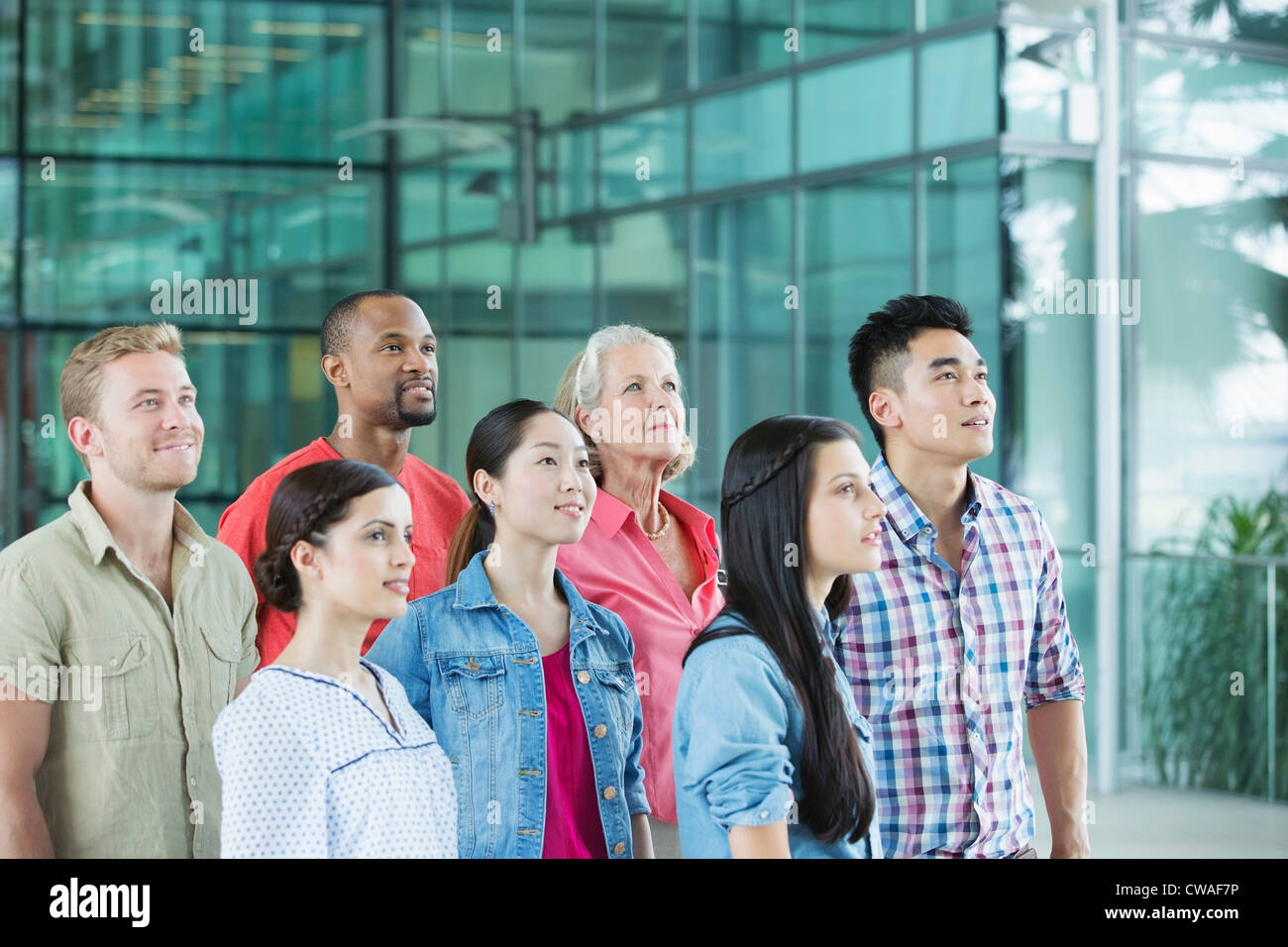 Group of people looking up Stock Photo - Alamy
